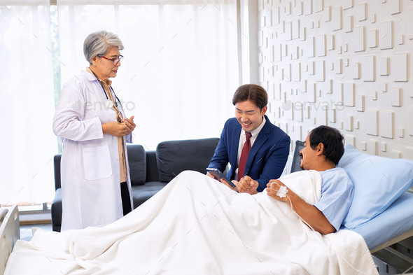 Hospital treatment room relative visit patient lay on bed doctor ...