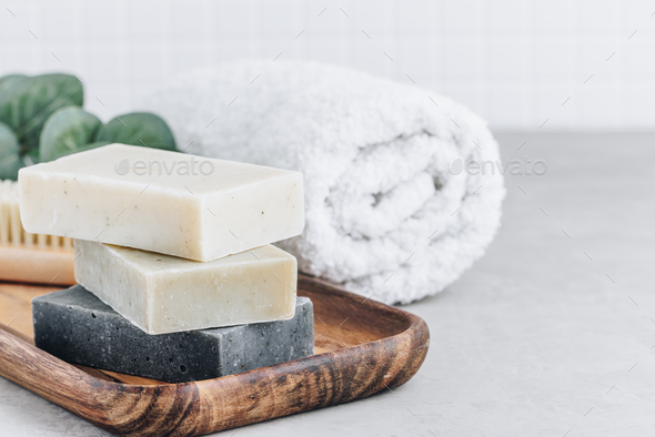Soap. Organic soap bars. Stack of natural soap bars on gray stone ...