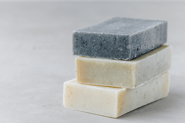 Soap. Organic soap bars. Stack of natural soap bars on gray stone ...