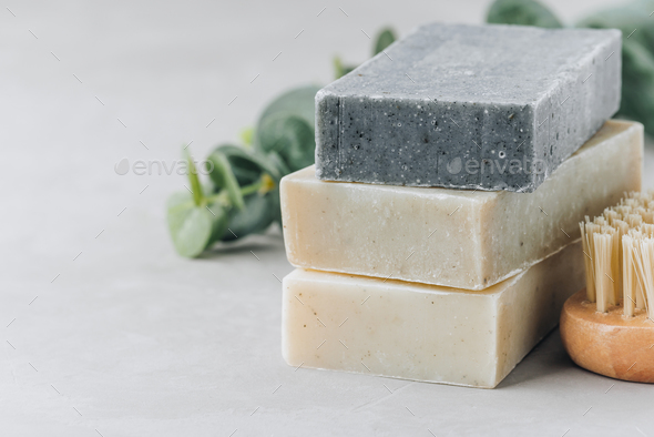 Soap. Organic soap bars. Stack of natural soap bars on gray stone ...