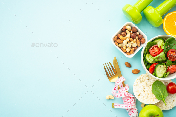 Diet food, healthy lifestyle and fitness background on blue. Stock ...