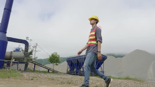 Engineer Walking On Industrial Factory Site, Stock Footage | VideoHive