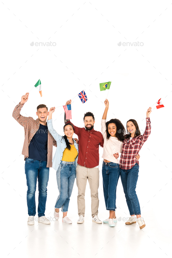 cheerful multicultural group of people smiling with flags of different ...