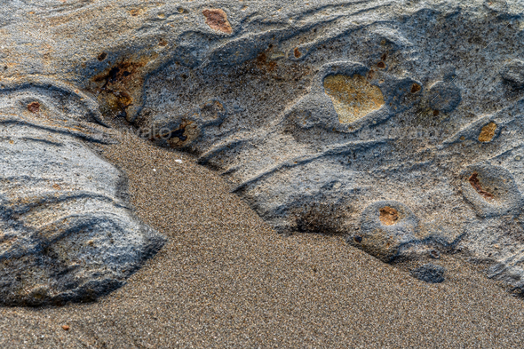 Rock texture sinking into the sand Stock Photo by irfanmnur | PhotoDune