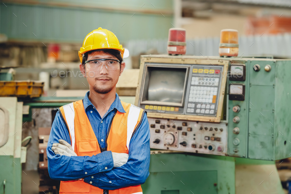 Steel factory staff smart worker portrait Asian man work in a heavy ...