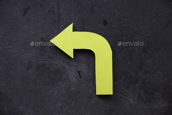 Yellow arrow pathway sign. Future life with direction or obsctacle ...