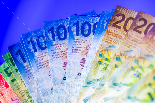 Pile of Colourful Swiss Francs Stock Photo by duallogic | PhotoDune