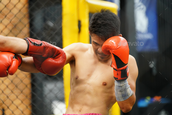Muay Thai, The martial art of Thailand, Power punches into the face of ...