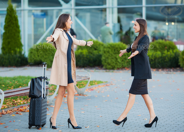 Friend welcome back by embracing airport. hall international missing ...