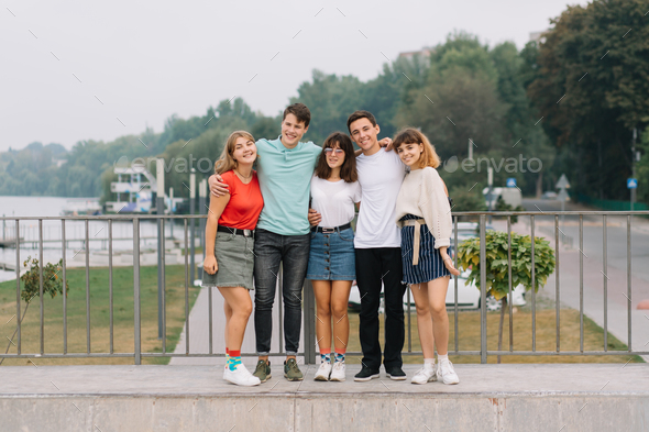 Summer holidays and teenage concept - group of smiling teenagers ...