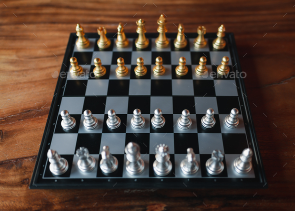 Chess board game between silver team and golden team by king golden ...