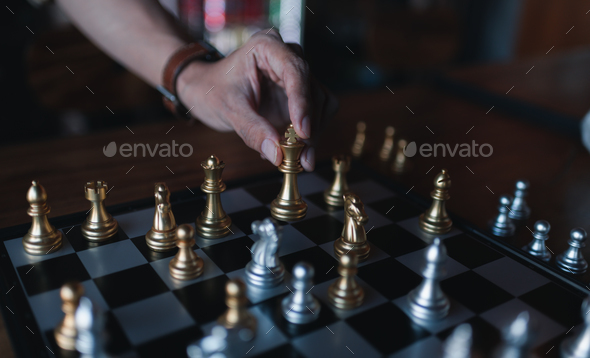 Chess board game between silver team and golden team by king golden ...