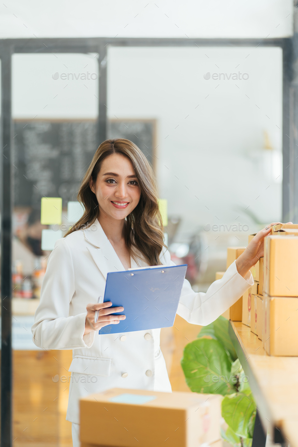 Startup small business SME, Entrepreneur owner using smartphone or ...