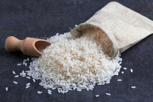 Rice in bag Stock Photo by pioneer111 | PhotoDune