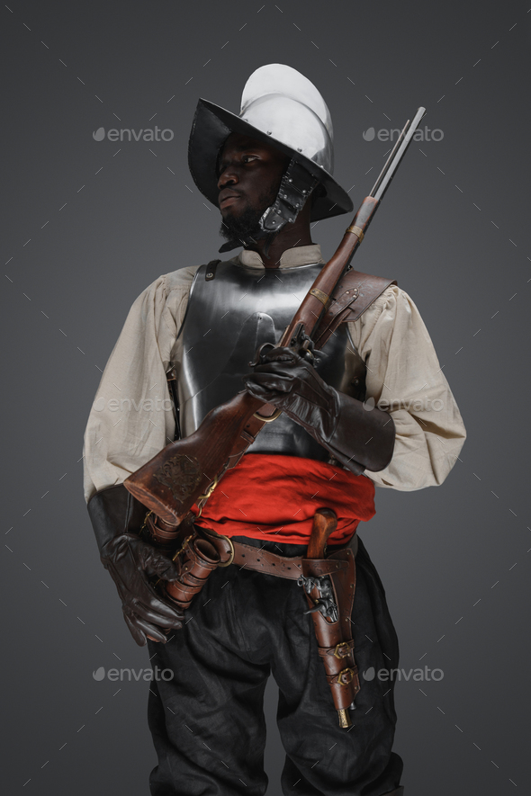 Medieval soldier with steel armor and flintlock musket Stock Photo by ...