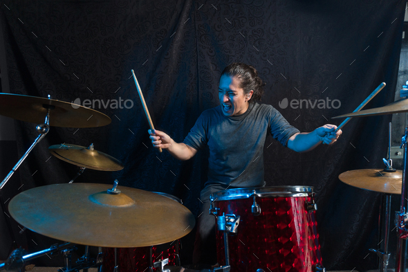Powerful Rhythms: A Young Drummer Given His Passion Stock Photo by ...