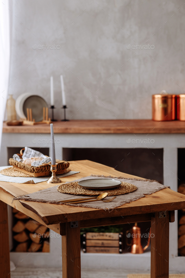 Authentic wooden table against a blurred rustic kitchen background ...