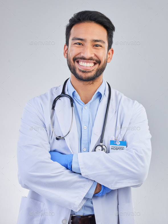 Doctor, man and portrait in a studio with a smile from success ...