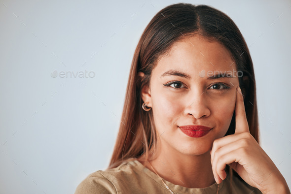 Thinking, woman portrait and happy face closeup of a young female with ...