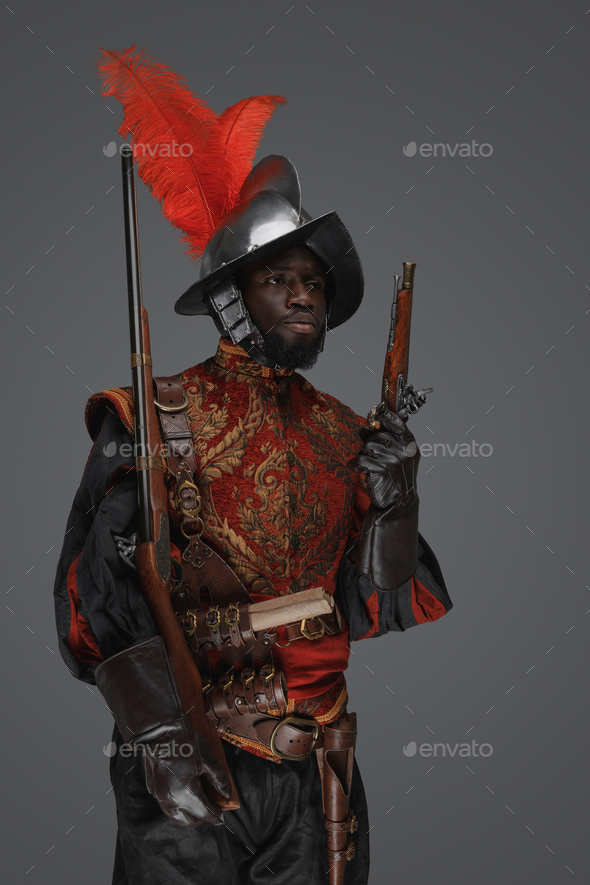 18th century soldier with plumed helmet and flintlock guns Stock Photo ...