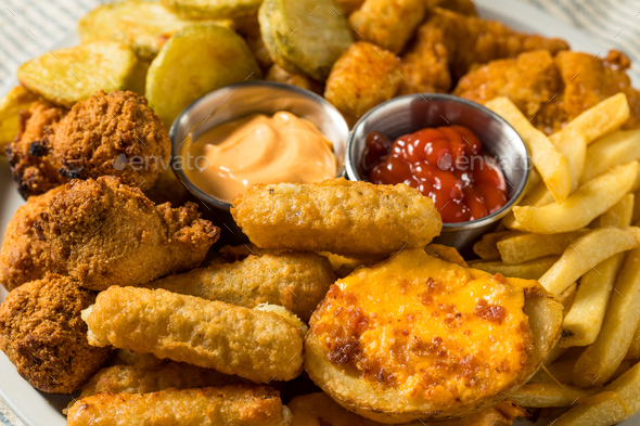 Deep Fried Appetizer Platter with French Fries Stock Photo by bhofack2