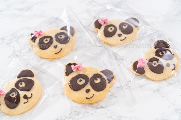 Panda shaped shortbread cookies with chocolate icing Stock Photo by ...