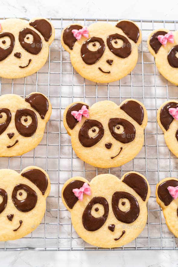 Panda shaped shortbread cookies with chocolate icing Stock Photo by ...