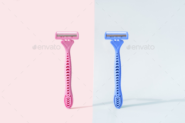 Razors with gender colors against pink and blue background Stock Photo ...