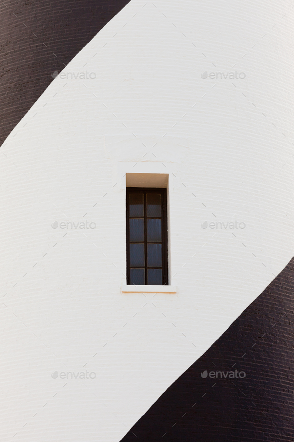 Black white painted brick wall lighthouse window Stock Photo by pilens