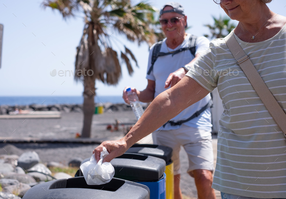 Caucasian Senior Couple of People Throwing Away Waste in Recycle ...