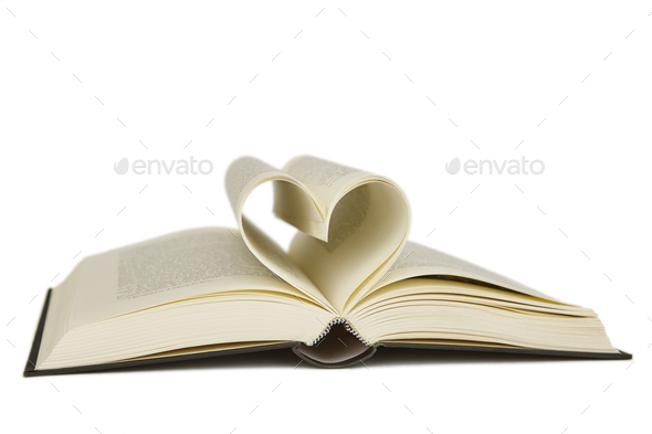 Open book with heart shaped pages. Love for reading Stock Photo by ABBPhoto