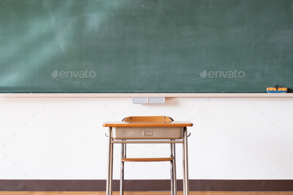 An image of a Japanese elementary school classroom with a blackboard ...