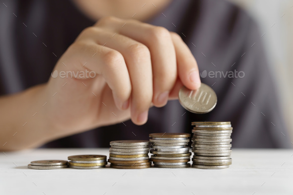 A Japanese elementary school boy is accumulating money steadily. Stock ...