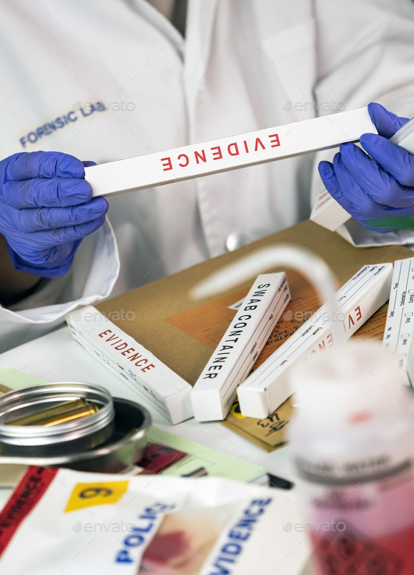 Police scientist pulls out isope with sample of evidence implicated in ...