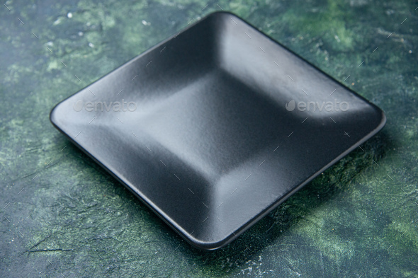 front view black empty plate square shaped on a dark background table ...