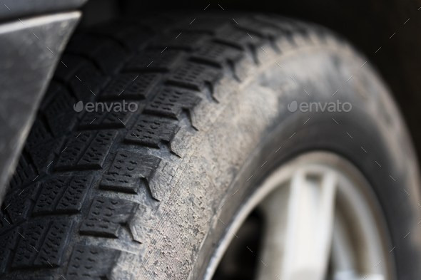Car wheels, dirty wheels on street. Car concept Stock Photo by SkloStudio