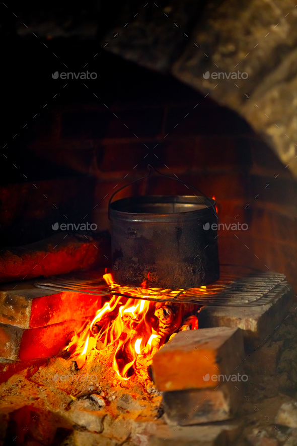 pot on fire. kettle on fire. Cooking on an Open Fire in a Tourist Pot ...