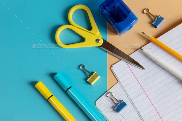 Back to school or education concept. Top view color paper, scissors ...