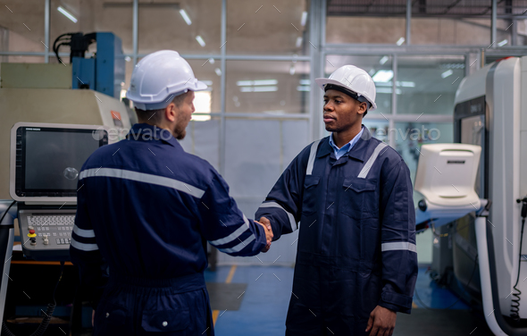 Engineer technician under control digital factory production technology ...