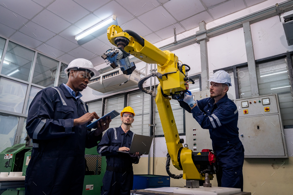 Engineer technician under control digital factory production technology ...