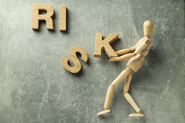 Risk protection and eliminating the risk, top view Stock Photo by ...