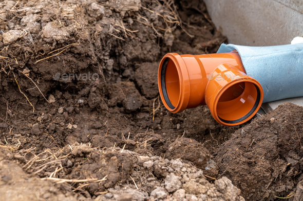 plastic pvc waste sewer pipe in the ground. construction site Stock ...