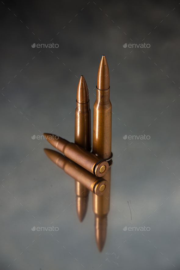 brown bullets on dark background shooting gun tank war Stock Photo by ...