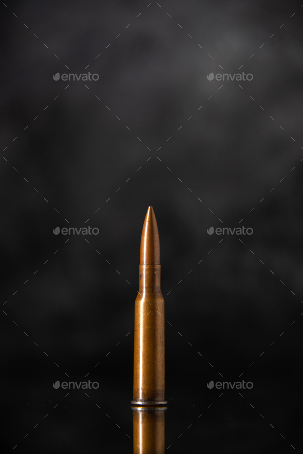single bullet on the dark background shooting gun tank death war Stock ...