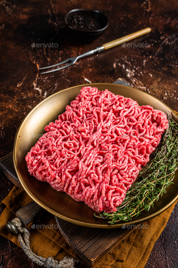 Fresh mutton lamb Mince Meat, raw ground meat. Dark background. Top ...