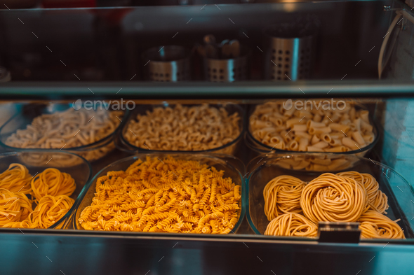 Italian food. Homemade pasta in a shop display at a farmer's market in ...