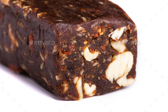 Raw pressed date with nuts and fruit bars isolated on white background ...