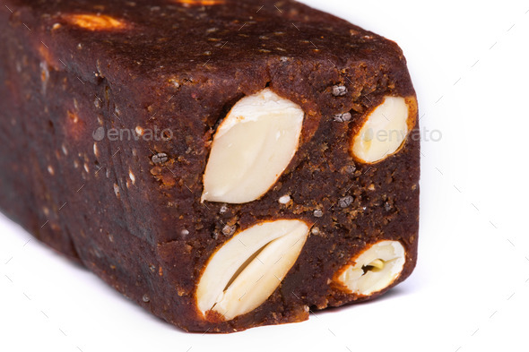 Raw pressed date with nuts and fruit bars isolated on white background ...