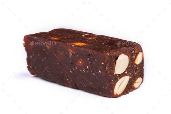 Raw pressed date with nuts and fruit bars isolated on white background ...