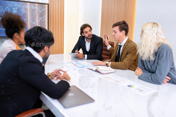 Employee on job corporate Business colleagues sit around table work as ...